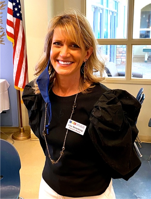 LisaNierenberg, the Executive Director of Center for the Arts Evergreen,